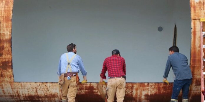 How They Transformed A Rusty Tank Into A Tiny House